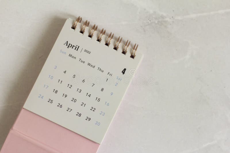 Desktop Calendar for April 2022 for Planning on the Table Stock Image ...