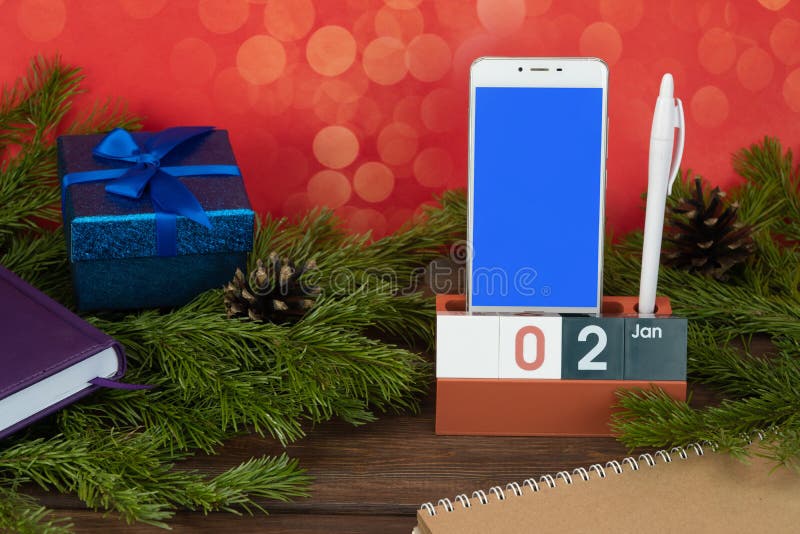 Desktop Calendar with the Date January 02 and a Cell Phone. Plans for ...