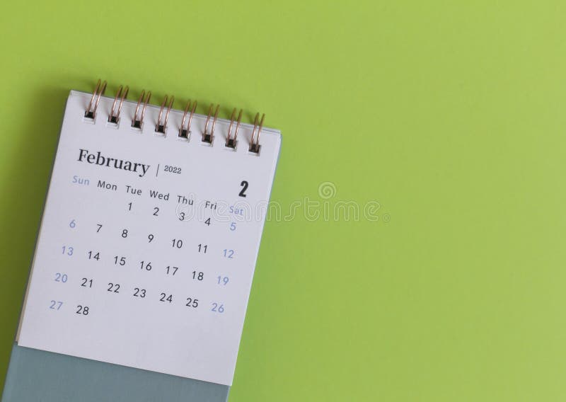 Desktop Calendar for February 2022 on a Green Background Stock Image ...