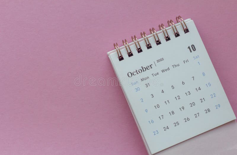 Desktop Calendar for October 2022 on a Pink Background Stock Photo ...