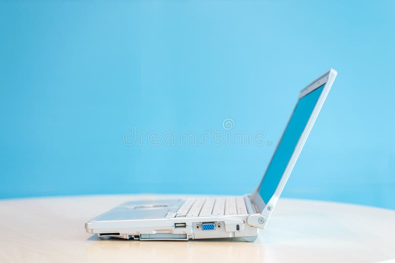 Desktop Compute in Front of Blue Background Stock Photo - Image of ...