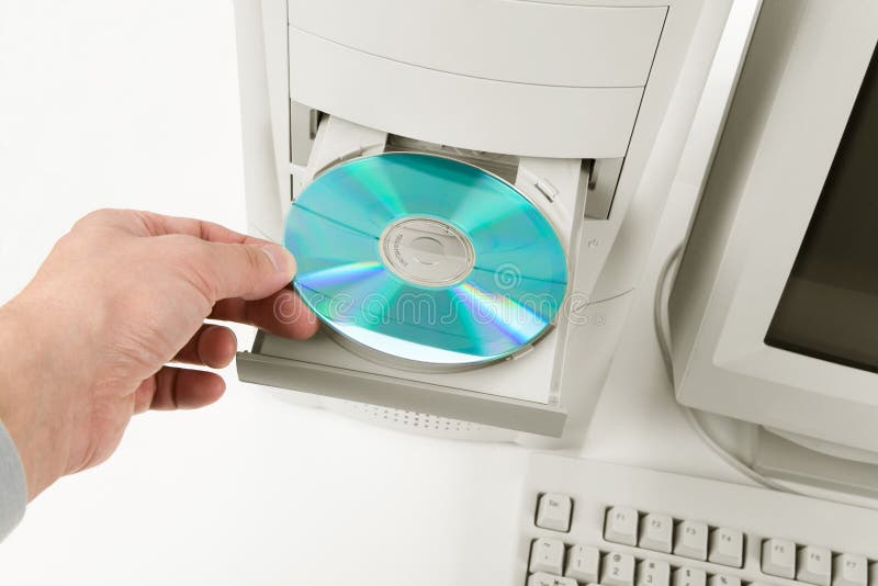 Inserting the CD stock image. Image of insert, holding - 168901