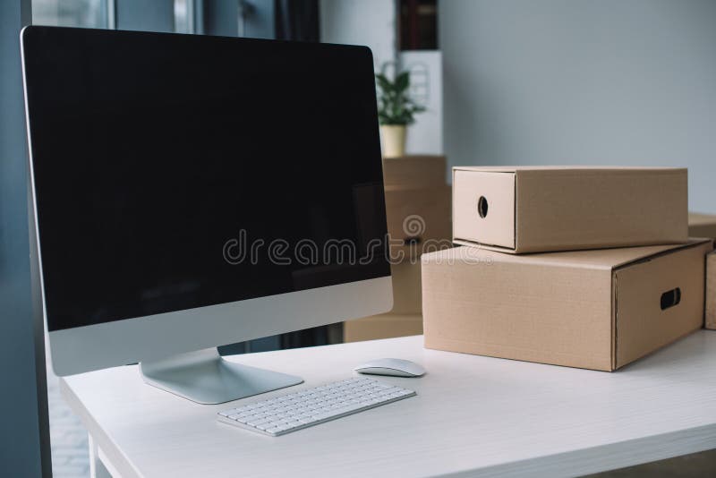 Desktop Computer with Blank Screen and Wooden Plane Model Stock Image ...