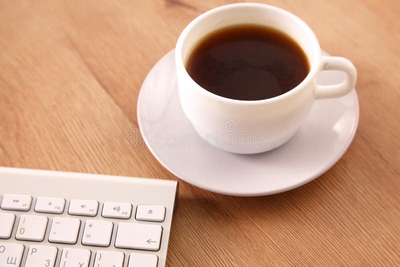 On the Desktop Computer and a Cup of Coffee Stock Photo - Image of ...