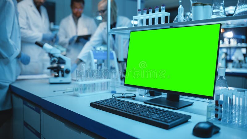 Desktop Computer with Green Screen Mock Up on the Display Screen ...