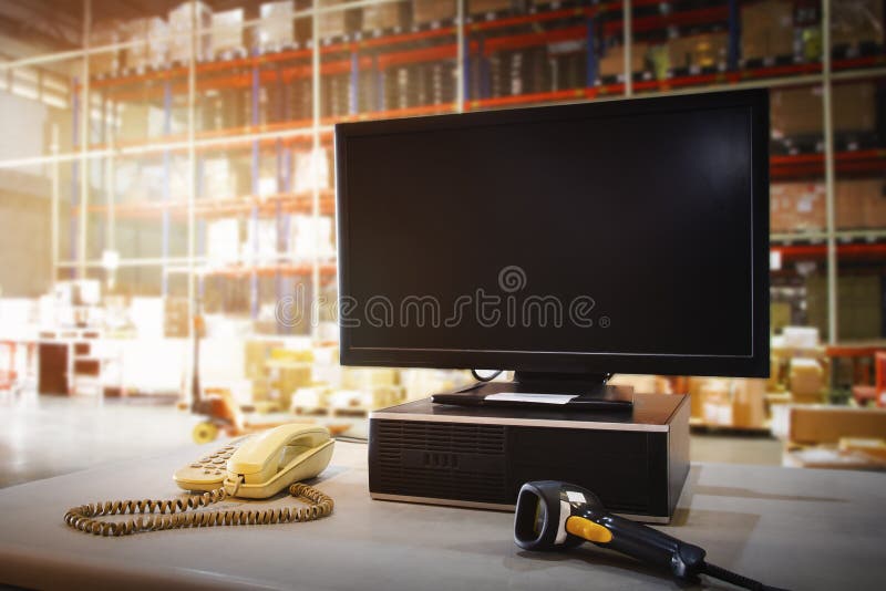 Desktop Computer on Table in Distribution Warehouse Space. Warehouse ...