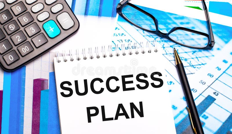 The Desktop Contains Colored Tables, a Calculator, Glasses, a Pen and a ...