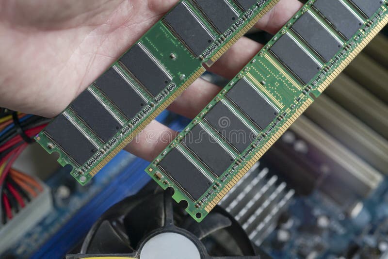 Desktop DDR RAM in Hands, Against the Background of a Computer ...