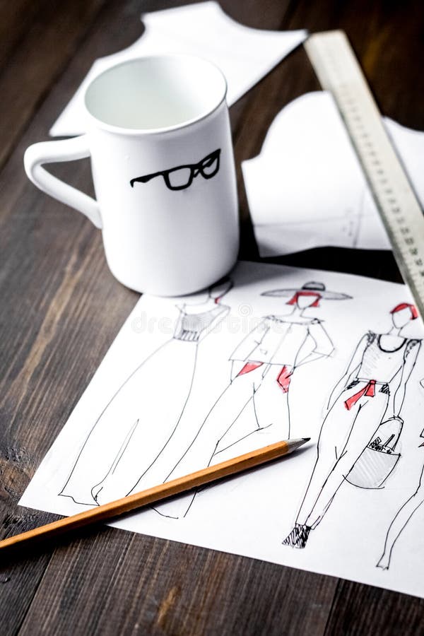 Desktop Designer Clothes with Tools at Wooden Table Stock Image - Image ...