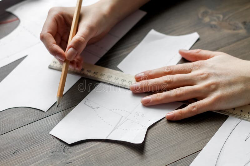 Desktop Designer Clothes with Tools at Wooden Table Stock Photo - Image ...