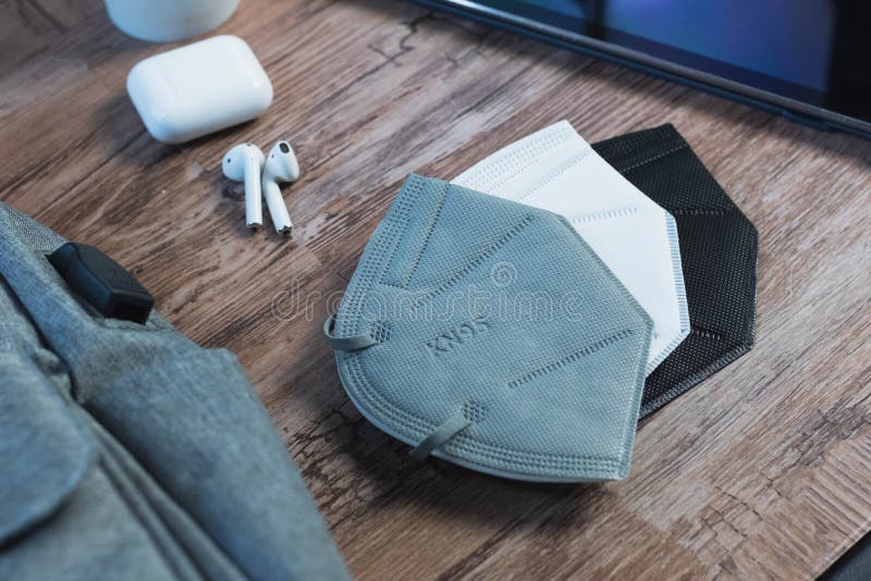 Desktop with Face Masks on Top and Office Elements Stock Image - Image ...