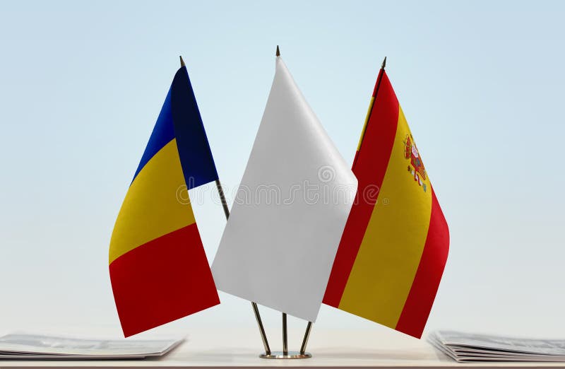 Flags of Romania and Spain stock photo. Image of assembly - 118990320