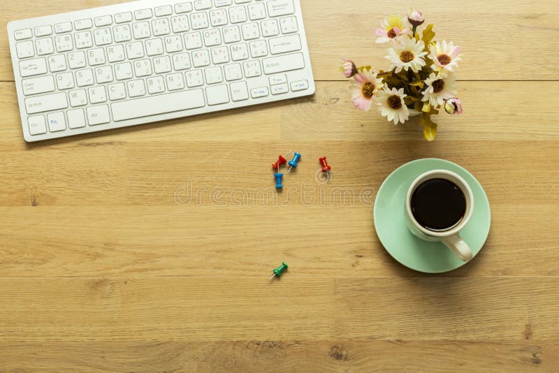 Desktop : Keyboard and Cup Coffee with Flowers Pot Stock Photo - Image ...