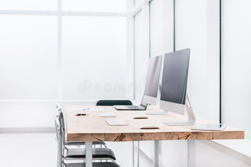 Desktop with Laptop and Computers in an Empty Office. Stock Photo ...