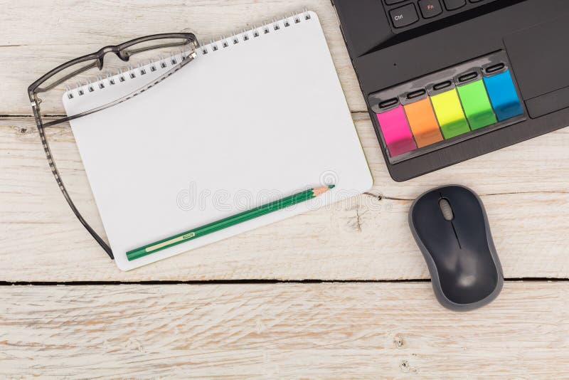 Desktop: Laptop and Notepad Stock Image - Image of laptop, wooden: 67597103