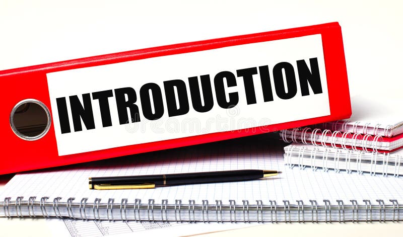 On the Desktop are Notebooks, a Pen and a Red Folder for Papers with ...