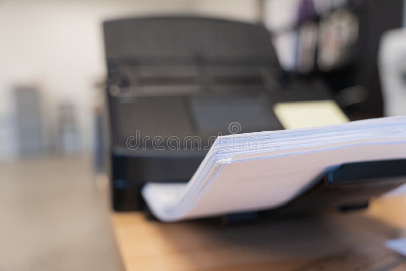 Desktop Paper Document Scanner with Stack of Documents Stock Photo ...