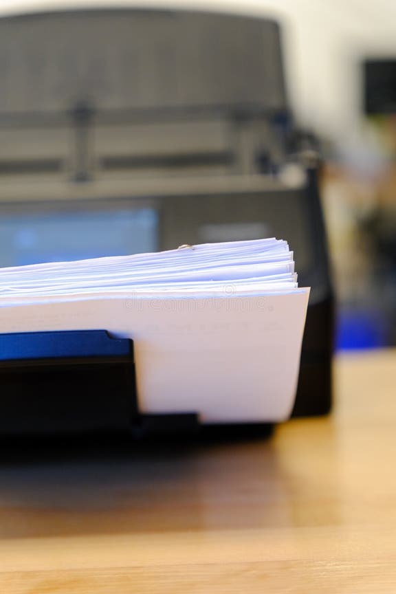 Desktop Paper Document Scanner with Stack of Documents Stock Photo ...