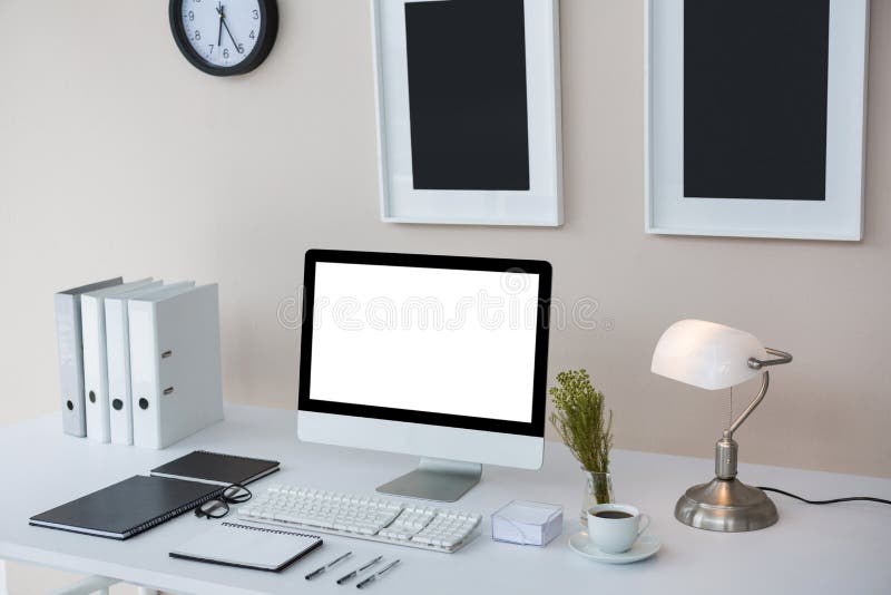 Desktop Pc on Desk with Picture Frames on Wall Stock Image - Image of ...
