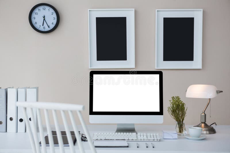 Desktop Pc on Desk with Picture Frames on Wall Stock Image - Image of ...