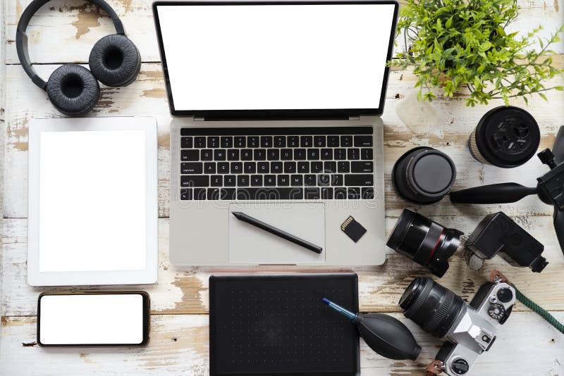 Desktop with Photography Equipment, Camera, Tripod,flash and Computer ...