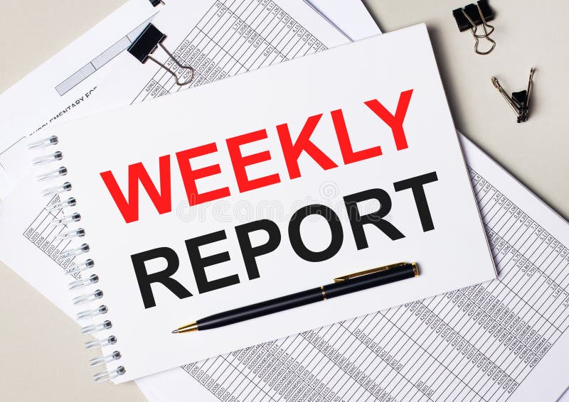 On the Desktop There are Documents, Pen, Black Paper Clips and a ...