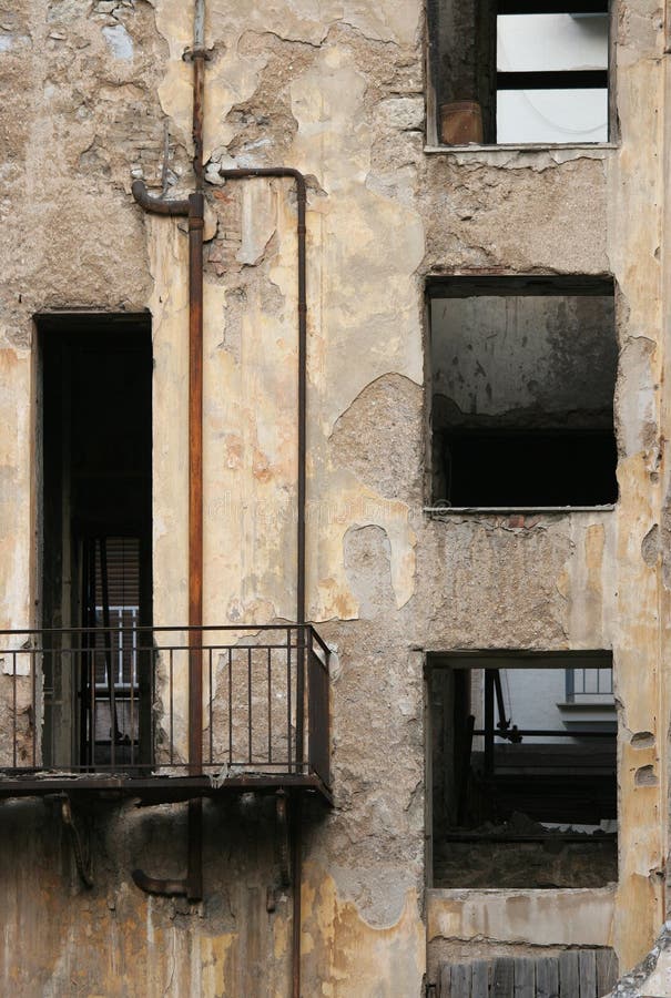Desolate Building with Broken Windows Stock Photo - Image of building ...
