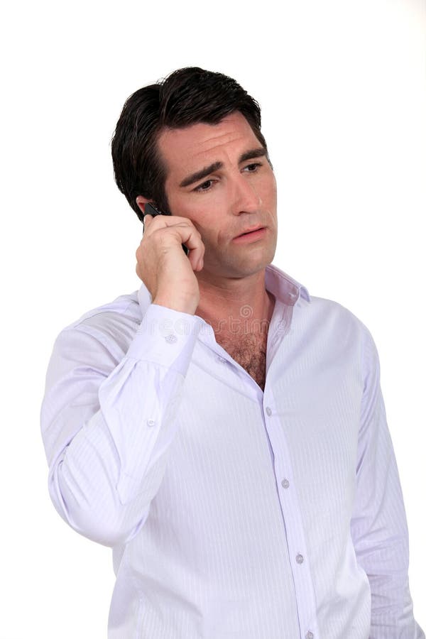 Desolate on the phone stock photo. Image of disconsolate - 33674604