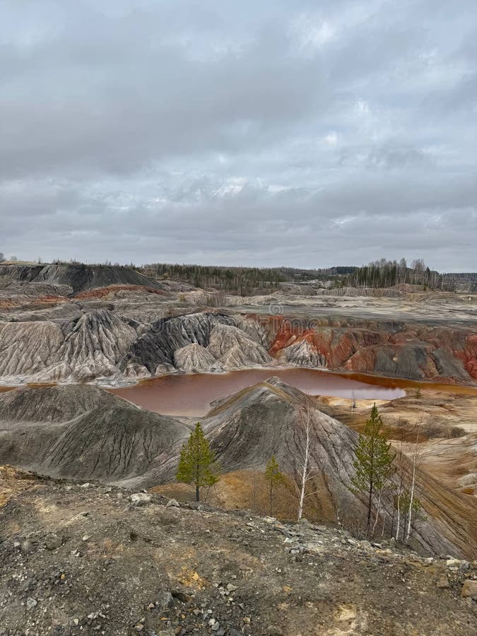 Desolate Quarry with Red Water Basin Stock Image - Image of mining ...