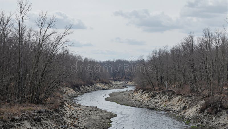 Desolate River Flowing through Barren Eroded Land after Deforestation ...