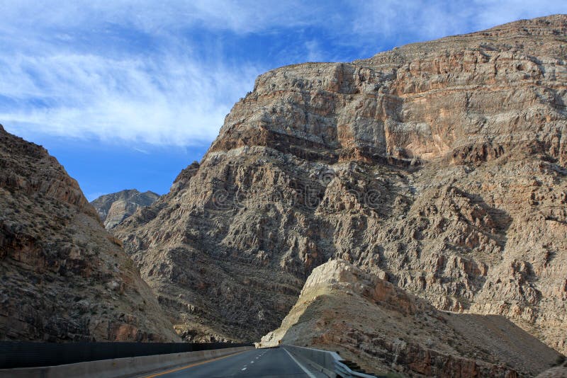 Desolate Road through Desert Mountains Stock Photo - Image of utah ...