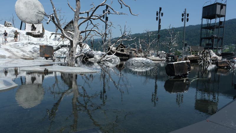 A Desolate Scene with a Large White Fake Moon in the Background ...