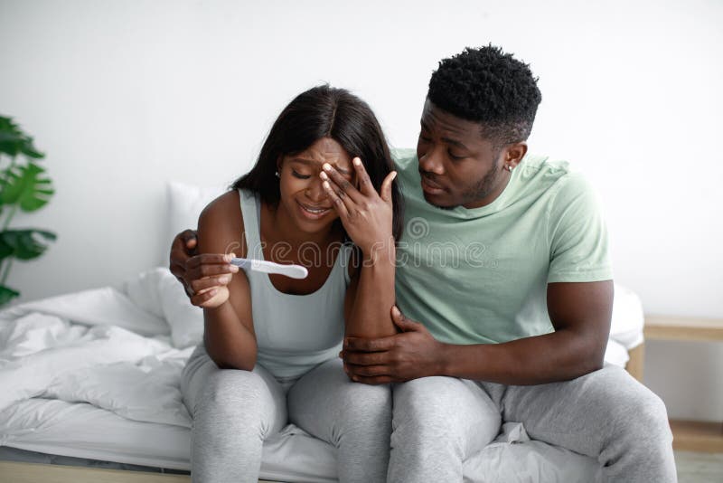 Despaired Sad Young African American Husband Hug Calm And Supporting
