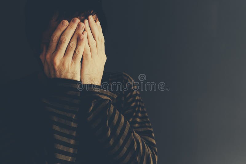 Desperate man crying alone stock photo. Image of dark - 132497684