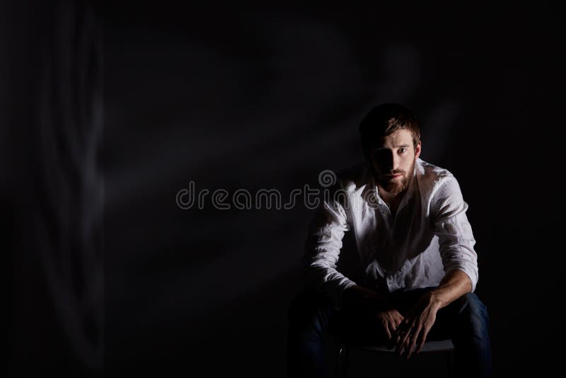 Desperate Man Sitting Alone Stock Photo - Image of loneliness ...