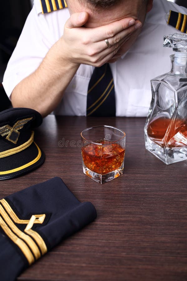 Desperate Pilot Drink Alcohol Stock Photo - Image of alcoholic, plunged ...
