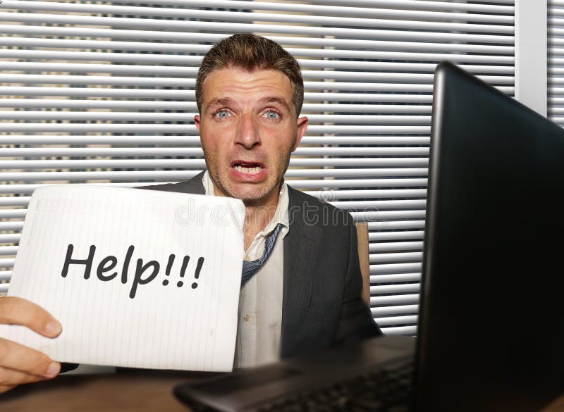 Desperate and Stressed Business Man Working Overwhelmed at Office ...