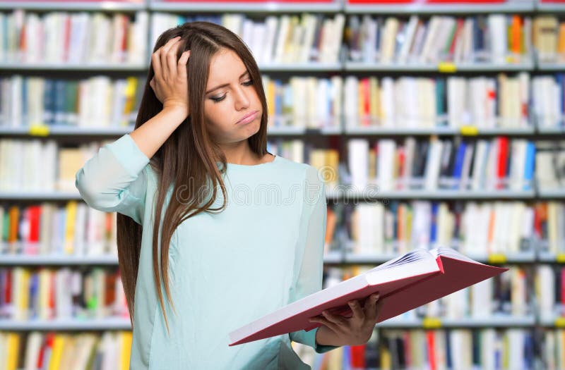 Desperate Woman Looking at Her Book Stock Image - Image of book, mood ...