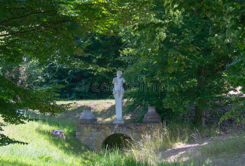 Dessau Roslau.Germany.06.21.2025 Classical Statue on the Bridge in the ...