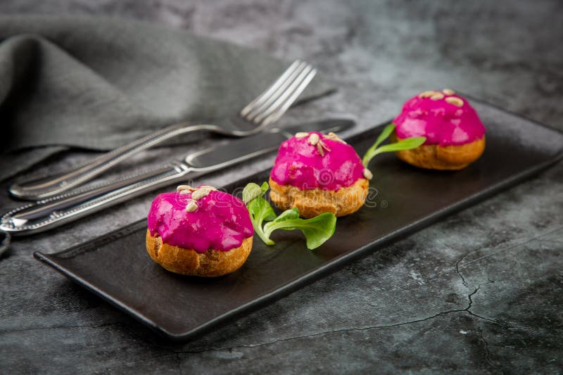 Dessert of Baked Buns with Raspberry Topping and Seed Decorations, Side ...
