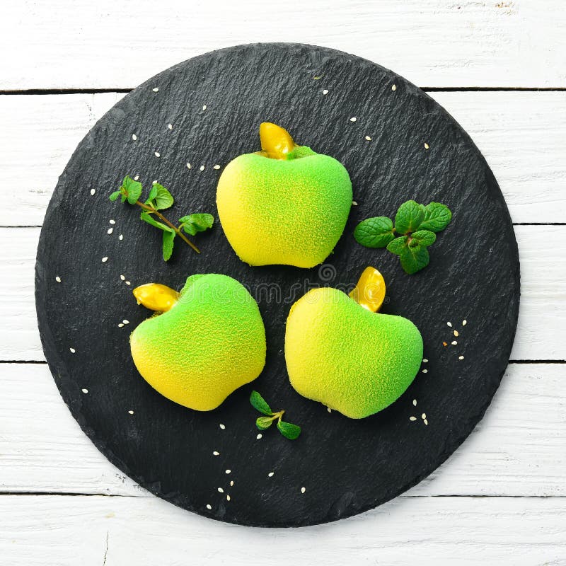 Dessert. Cream Cakes in the Shape of a Green Apple. Sweets Stock Image ...