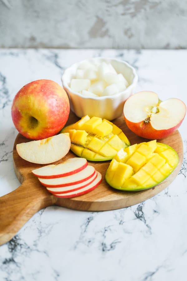 Dessert Fruits: Apples, Mango and Melon Stock Image - Image of board ...
