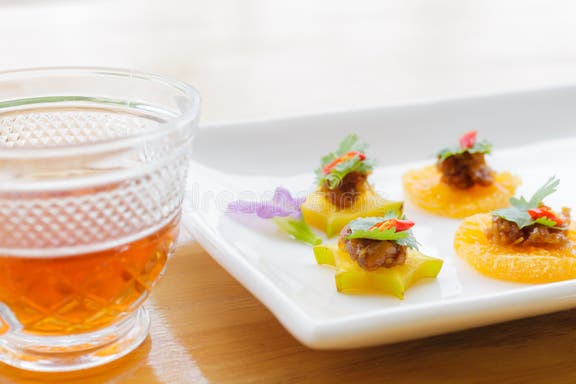 Dessert Name is ` MA HOR ` on the Dish and they are on the Table Stock ...