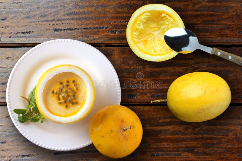 Dessert Passion Fruit Mousse in Fruit Rind on Plate Decorating Rustic ...