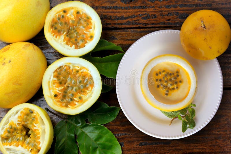 Dessert Passion Fruit Mousse in Fruit Rind on Plate Decorating Rustic ...