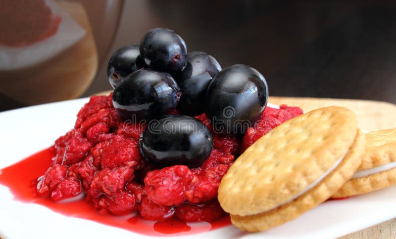 Dessert of Raspberry and Grapes Stock Photo - Image of seasonal ...