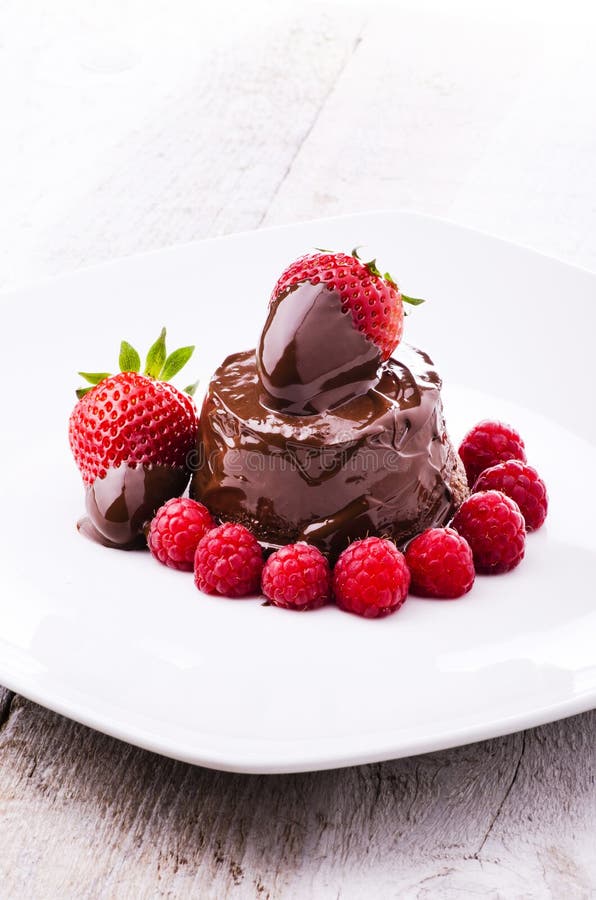 Dessert with Raspberry Strawberries and Melted Chocolate Stock Photo ...