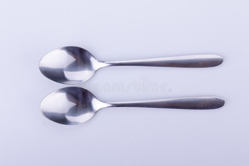 Dessert Spoon with Its Shadow on White Stock Photo - Image of clean ...