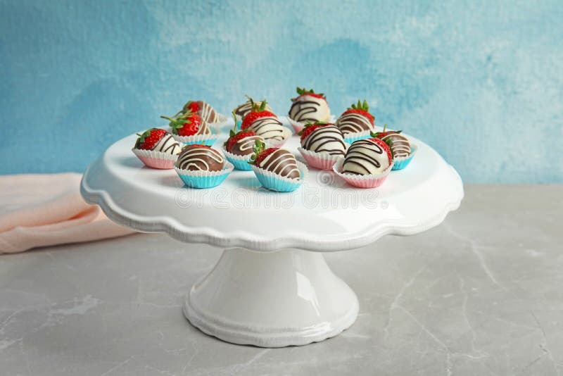 Stand with Chocolate Covered Strawberries on Table Stock Image - Image ...