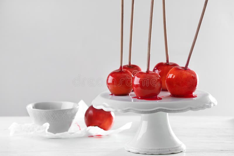 Dessert Stand with Delicious Candy Apples on Table Stock Image - Image ...